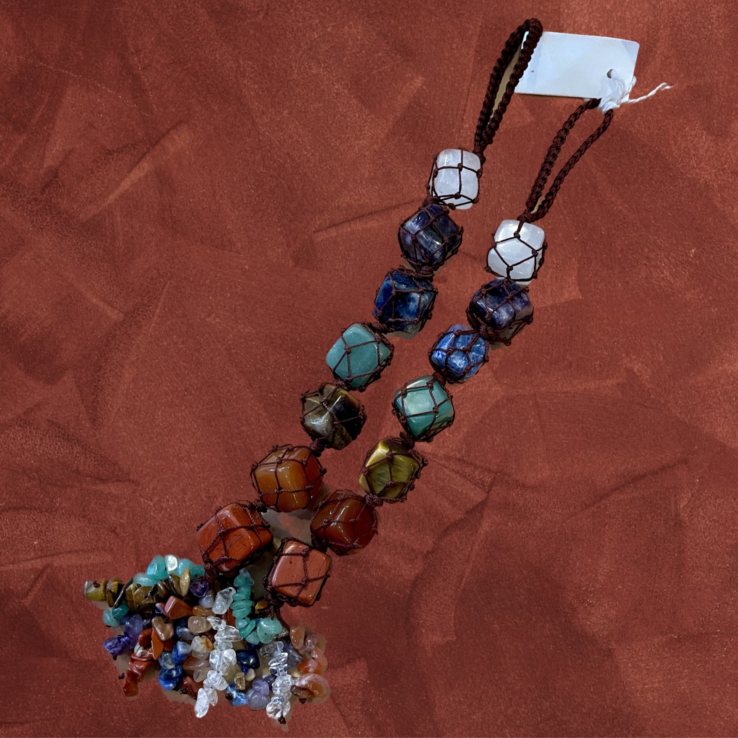 Hanging Chakra Stones In Net | The Rustic Candle Company in Tucson, AZ